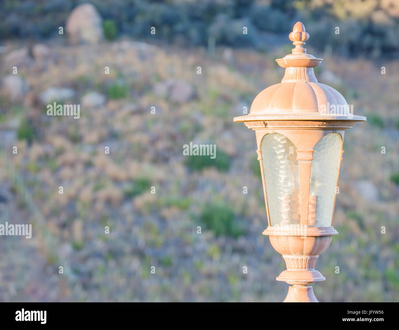 carriage lamp on hillside at sunset Stock Photo - Alamy