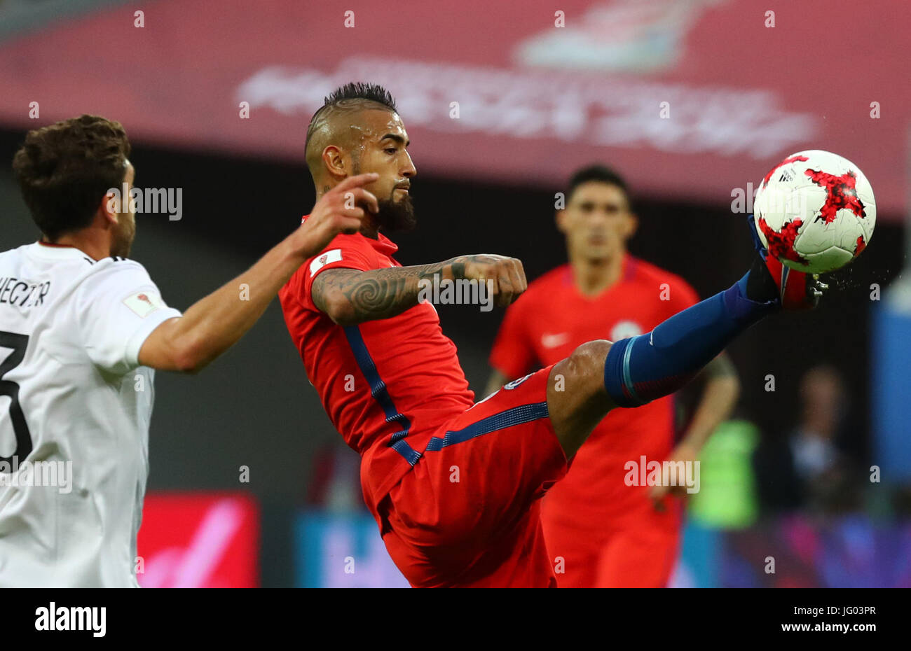 Saint Petersburg, Russia. 2nd July, 2017. Chile's Arturo Vidal (r) and ...