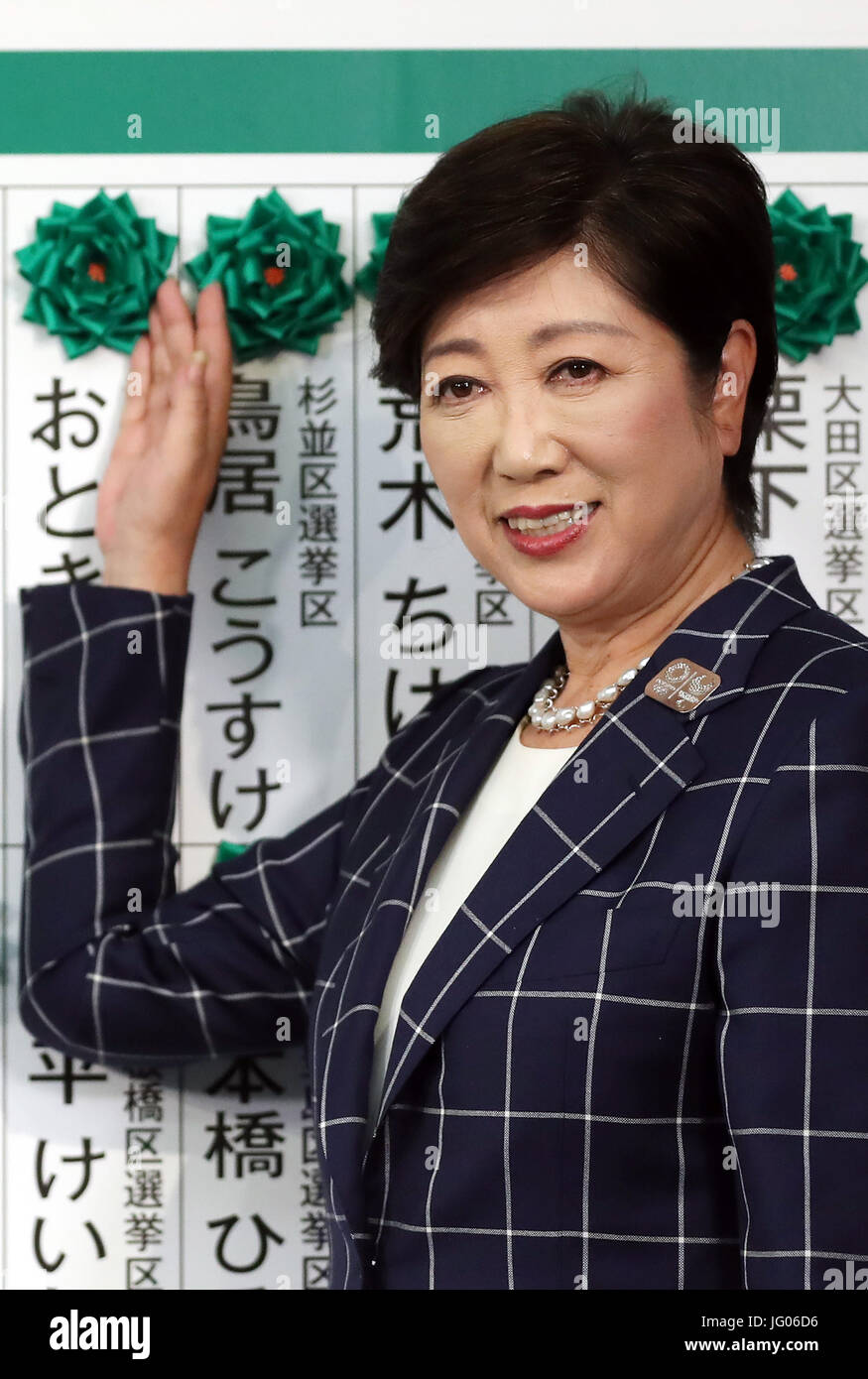 Tokyo, Japan. 2nd July, 2017. Tokyo Governor Yuriko Koike puts a ...