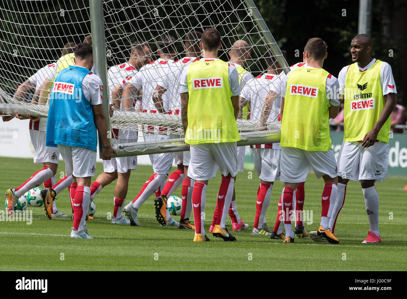 Cologne's Anthony Modeste (R) and teammates at a training session in ...