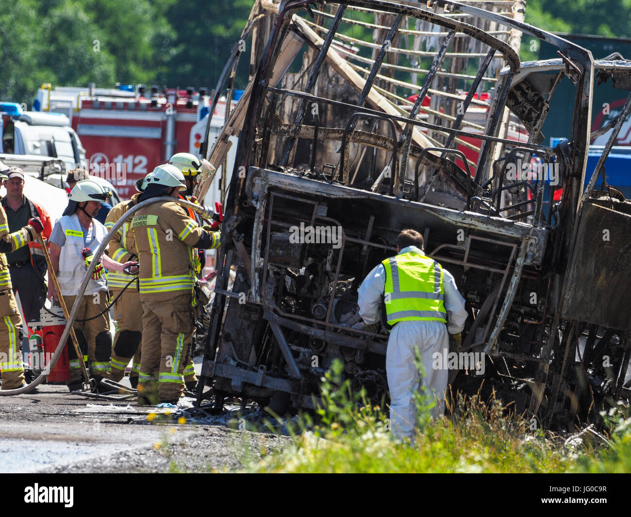 Muenchenberg, Germany. 3rd Jul, 2017. The burnt-out wreck of a coach ...
