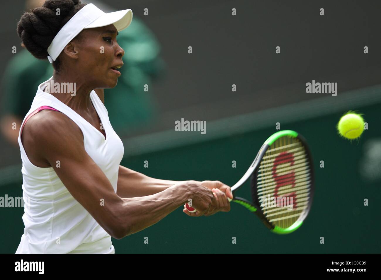 London, UK. 3rd July, 2017. Venus Williams of the United States returns ...