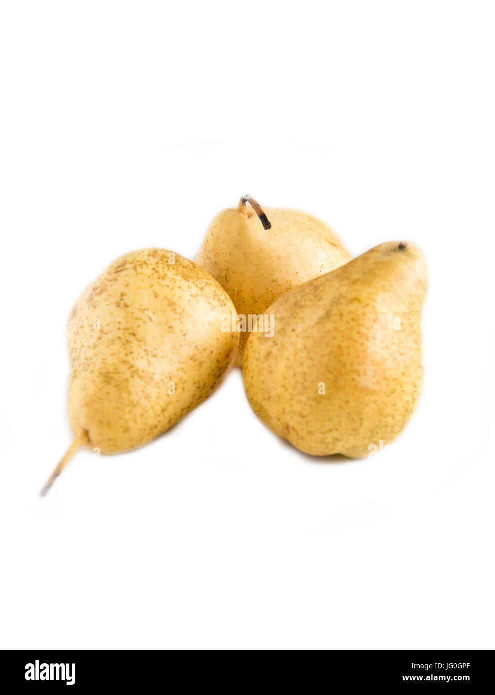 Three yellow pears isolated on white background Stock Photo - Alamy