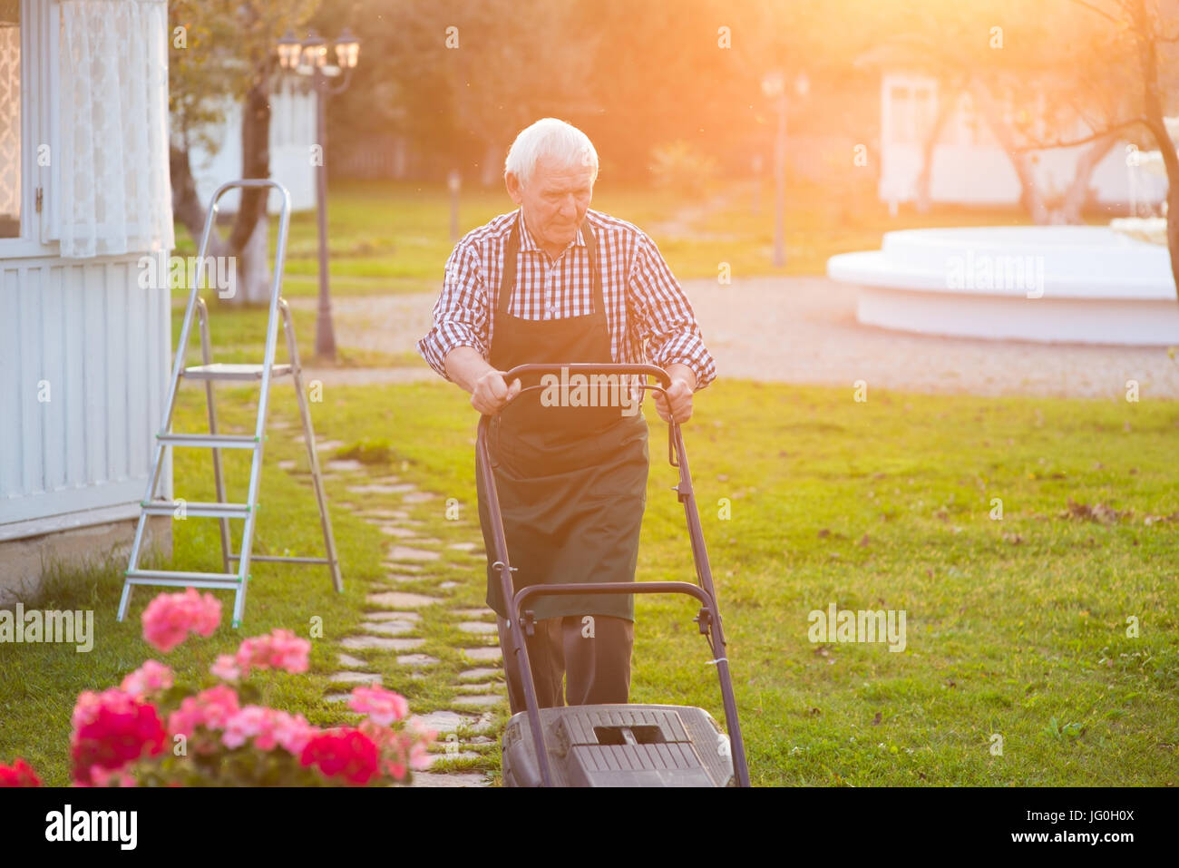 Old Man Lawn Mower High Resolution Stock Photography and Images - Alamy