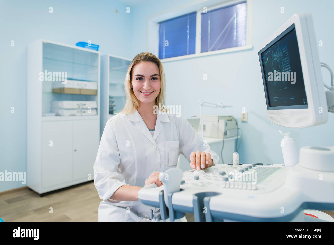 Ultrasound machine, doctor's hand usg investigation USCG Stock Photo ...