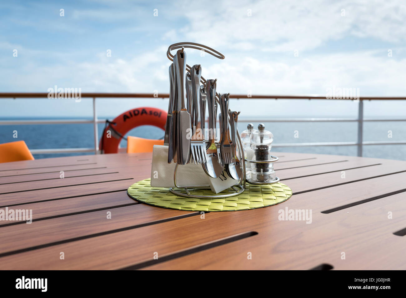 cutlery rack on a table in the outside area of the BELLA DONNA ...