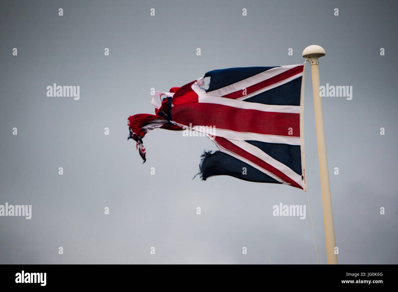 Flag uk torn hi-res stock photography and images - Alamy