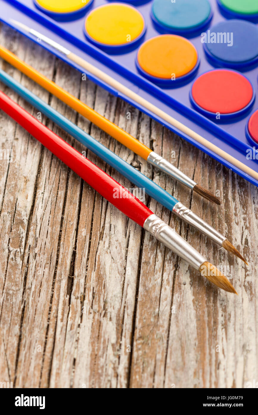 special painting tools on wooden background, education tools for ...