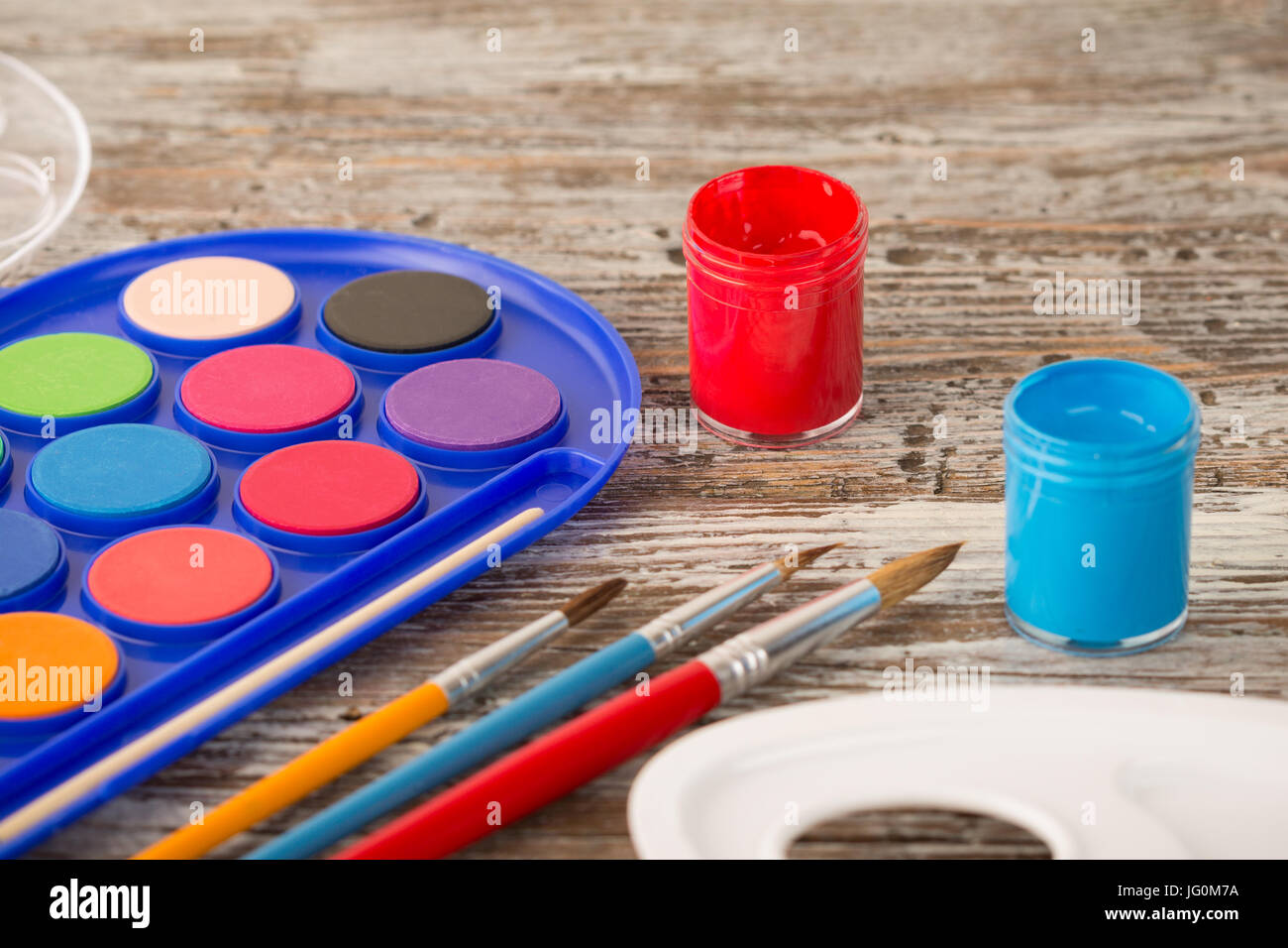 special painting tools on wooden background, education tools for ...