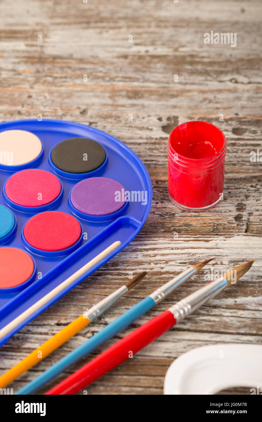 special painting tools on wooden background, education tools for ...