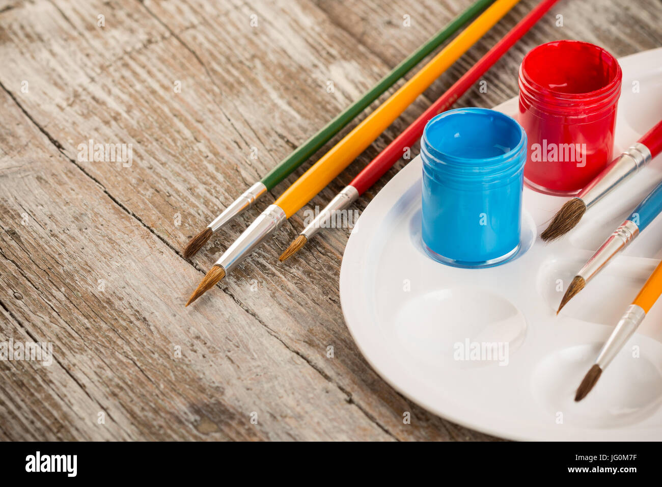 special painting tools on wooden background, education tools for ...