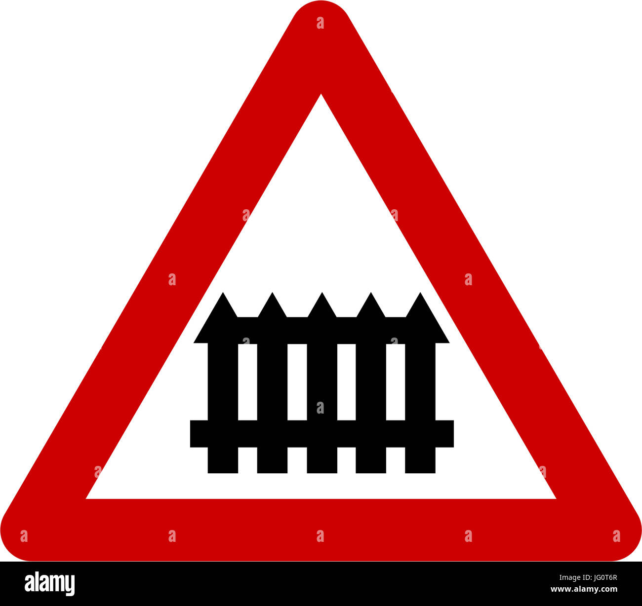 Warning sign with level crossing symbol Stock Photo - Alamy
