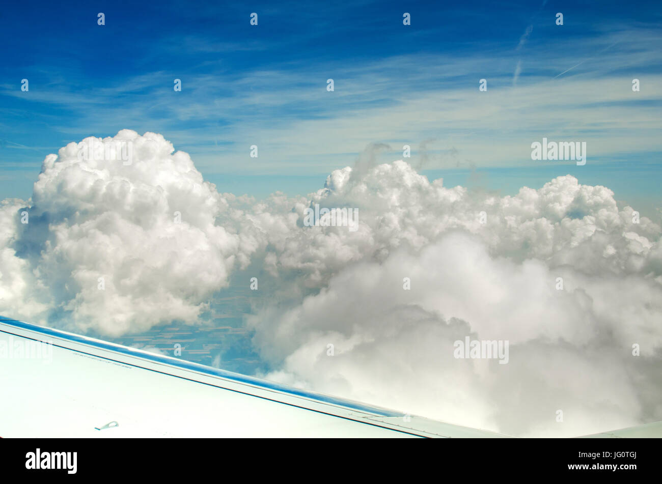 Beautiful sky with clouds and land view from plane Stock Photo - Alamy