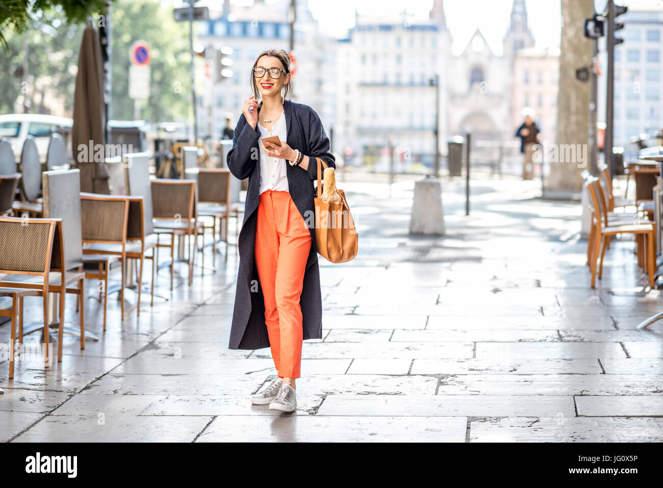 Lifestyle portrait of a french woman outdoors Stock Photo - Alamy