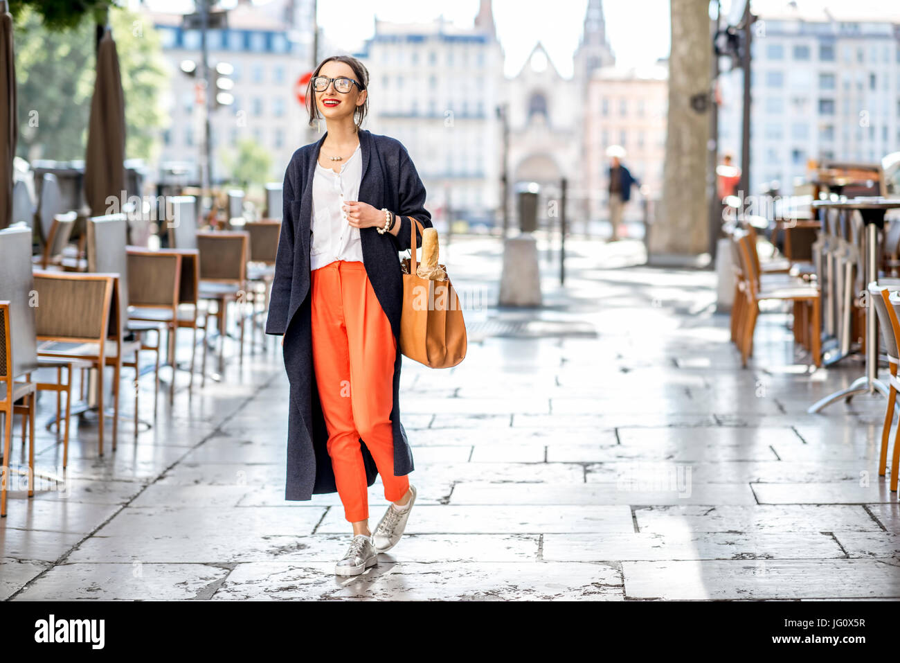 Lifestyle portrait of a french woman outdoors Stock Photo - Alamy