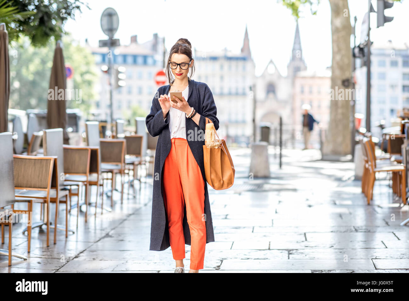 Lifestyle portrait of a french woman outdoors Stock Photo - Alamy