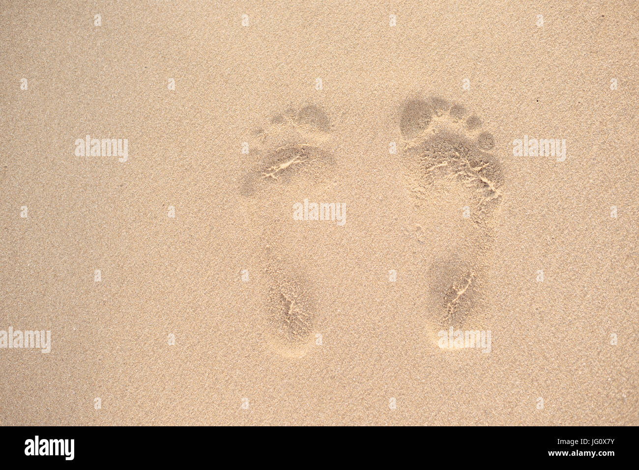 Man and woman footprints hi-res stock photography and images - Alamy