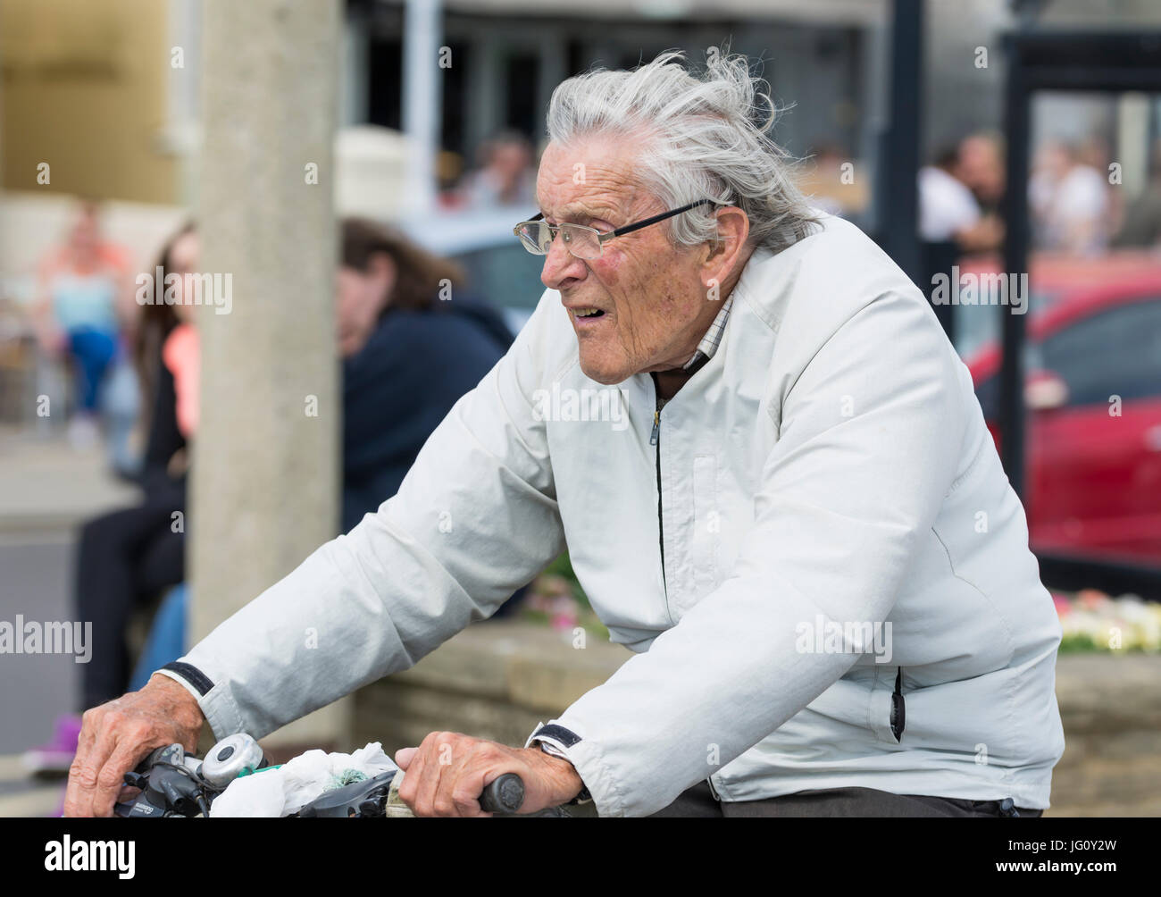 Elderly man cycling. Old male cyclist Stock Photo - Alamy