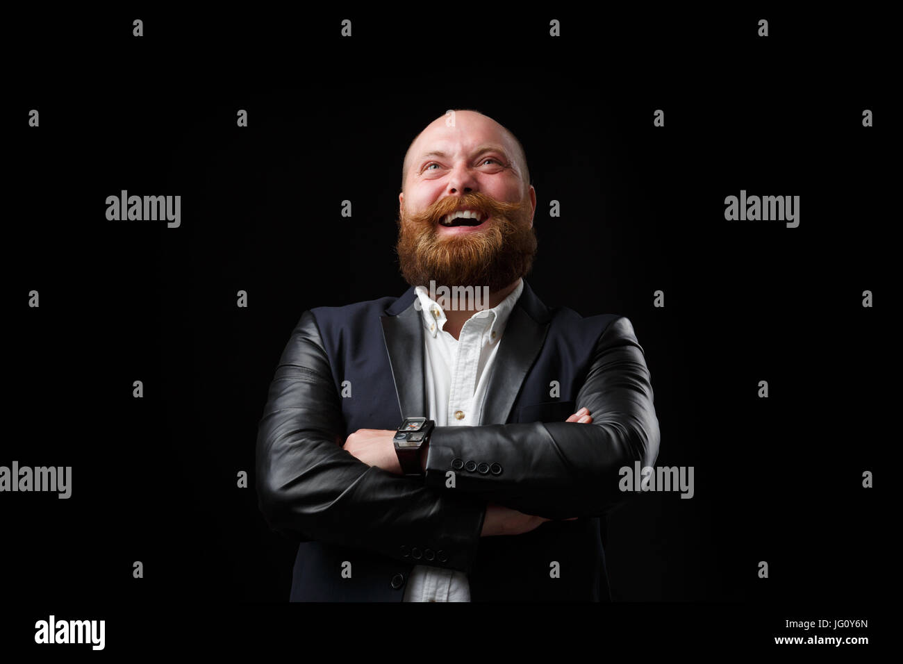 Happy, smiling man looking up Stock Photo - Alamy