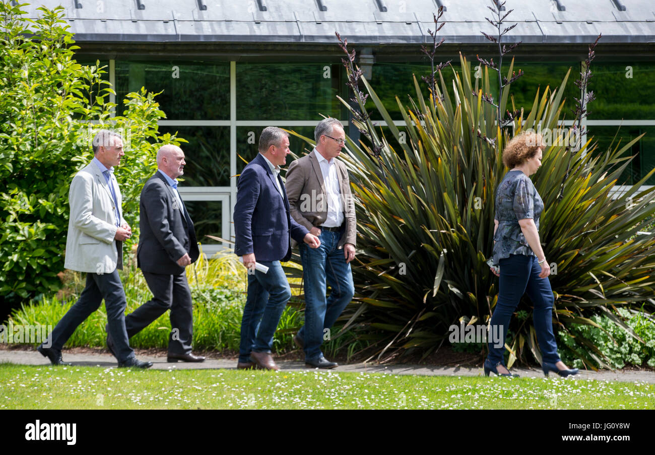 Sinn Fein's (left-right) Declan Kearney, Alex Maskey, Conor Murphy ...