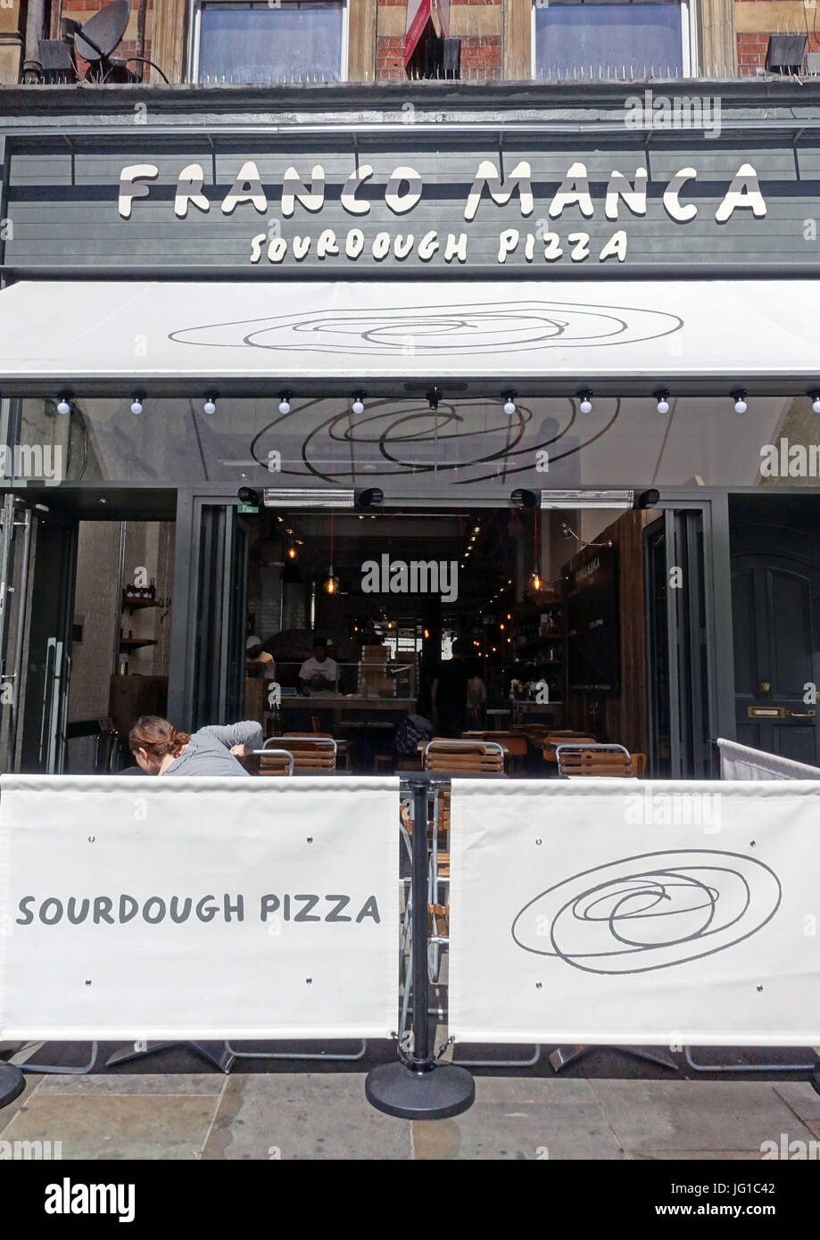 Franco Manca sourdough pizza restaurant, Islington, London Stock Photo ...