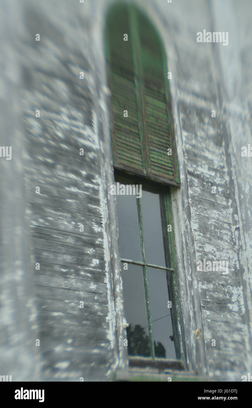 broken glass windows in old abandoned building Stock Photo - Alamy