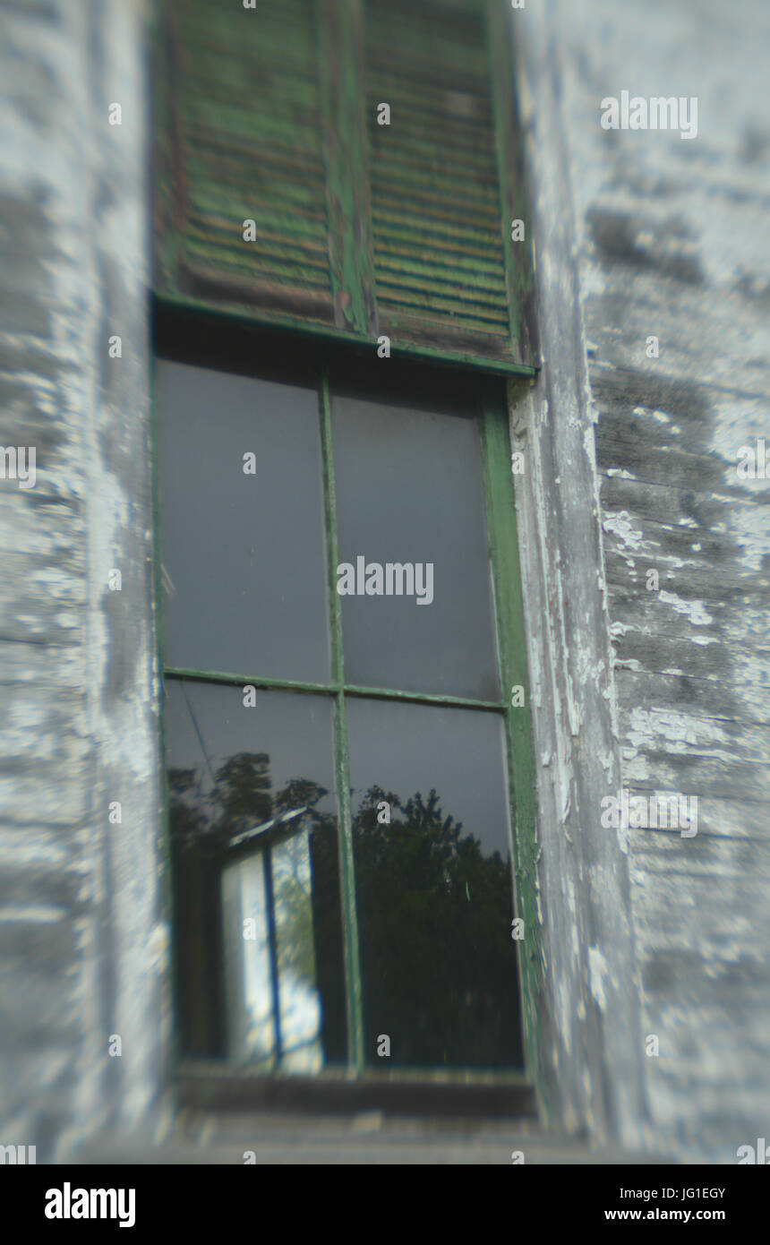 broken glass windows in old abandoned building Stock Photo - Alamy