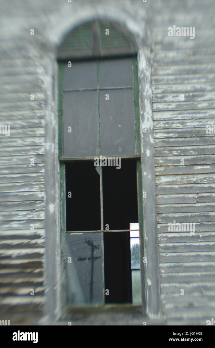 broken glass windows in old abandoned building Stock Photo - Alamy