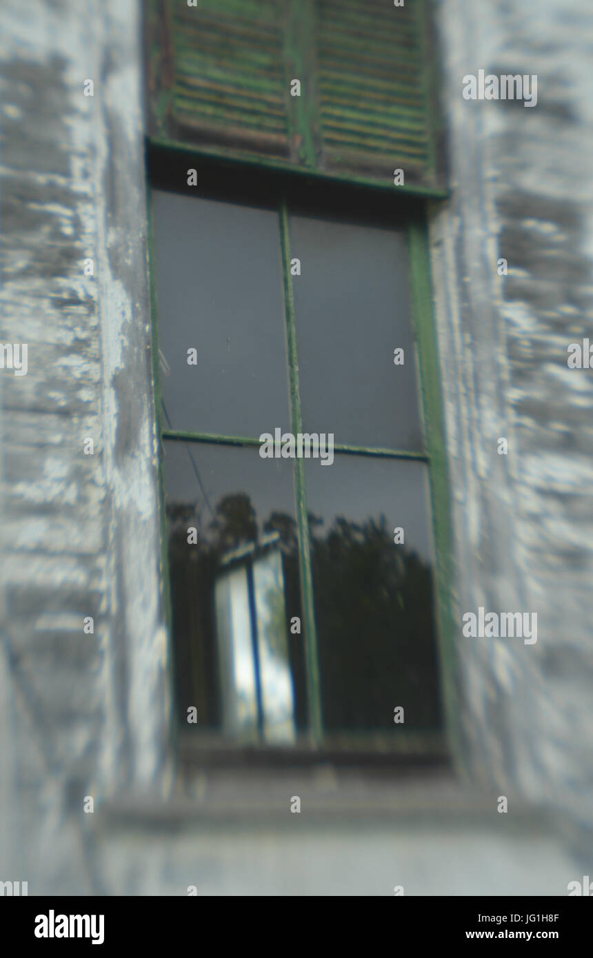 broken glass windows in old abandoned building Stock Photo - Alamy