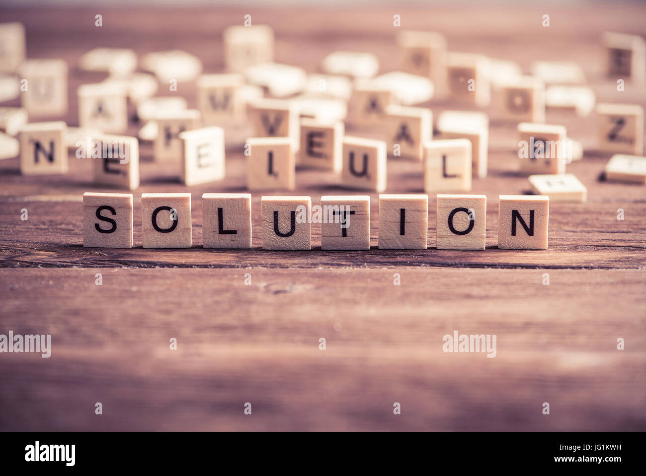 Wooden element with letter on wooden table spelling word problem ...