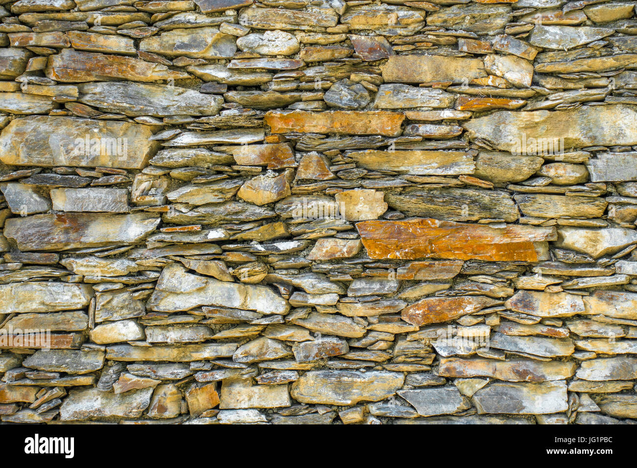 Structure of a natural stone wall Stock Photo - Alamy