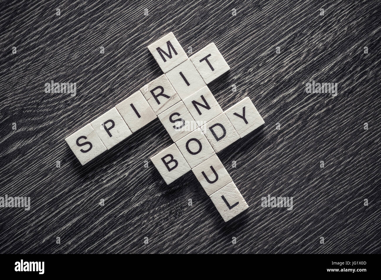 Words of business concepts collected in crossword with wooden cubes ...