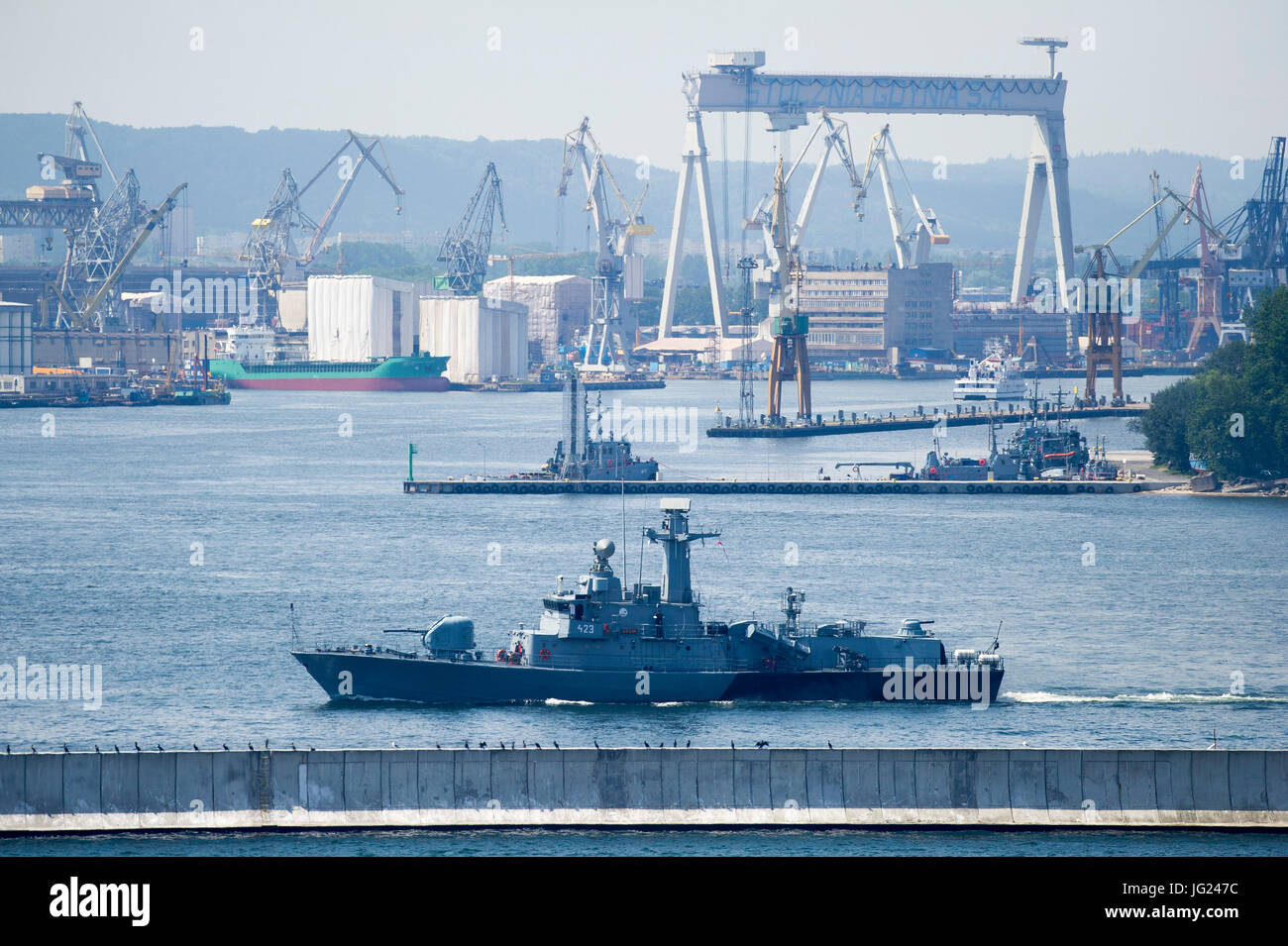 A Polish an Orkan class fast attack craft ORP Grom and Gdynia port and ...