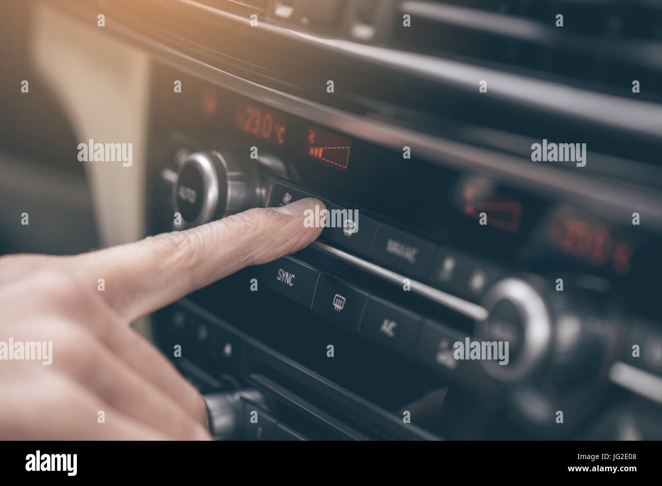 Young business person test drive new vehicle push button Stock Photo ...