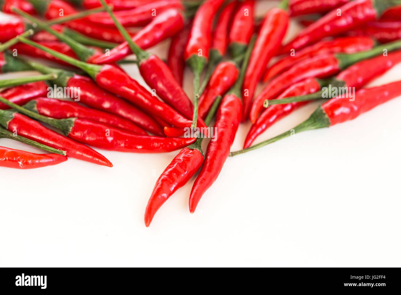 red hot chili peppers, popular spices concept - beautiful handful of ...