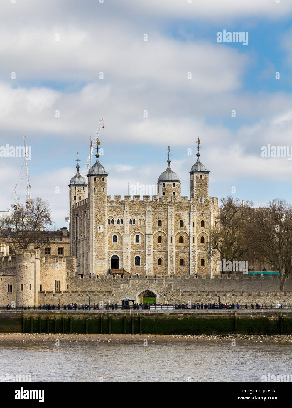 Tower of London located on the north bank of the River Thames in ...