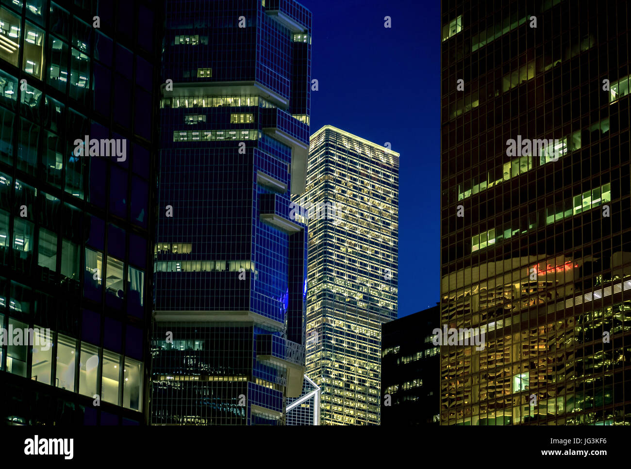 Commercial buildings at night in Hong Kong Stock Photo - Alamy