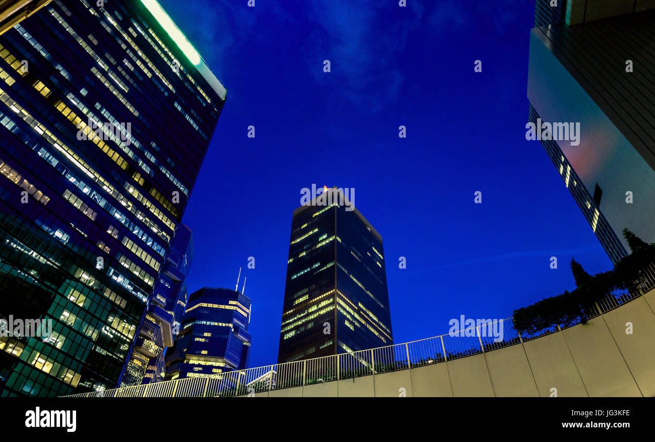 Commercial buildings at night in Hong Kong Stock Photo - Alamy