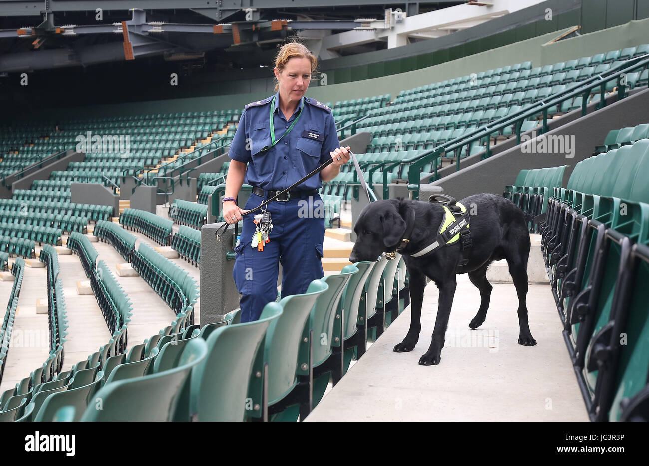 Sergeant Rowell with explosive sniffer dog Bertie checks court one ...