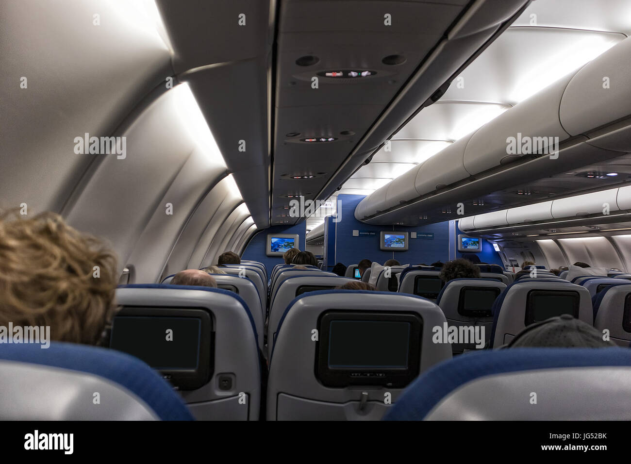 Airplane flight from inside woman hi-res stock photography and images ...