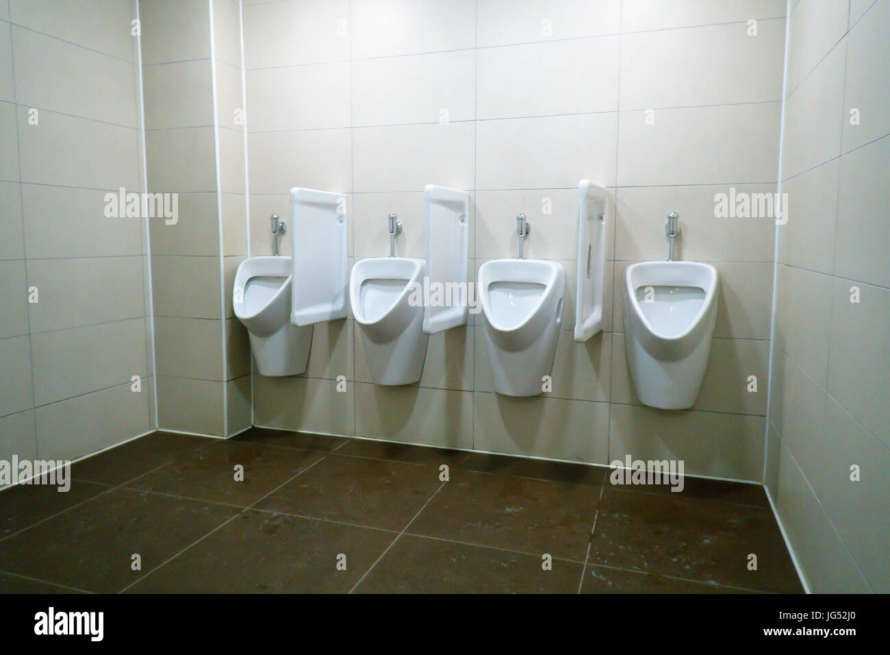 modern restroom interior with urinal row Stock Photo - Alamy