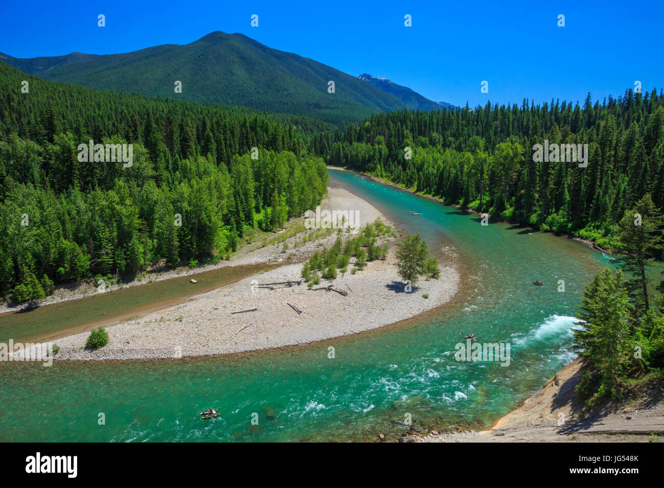 floaters on pontoon rafts paddling down the middle fork flathead river ...