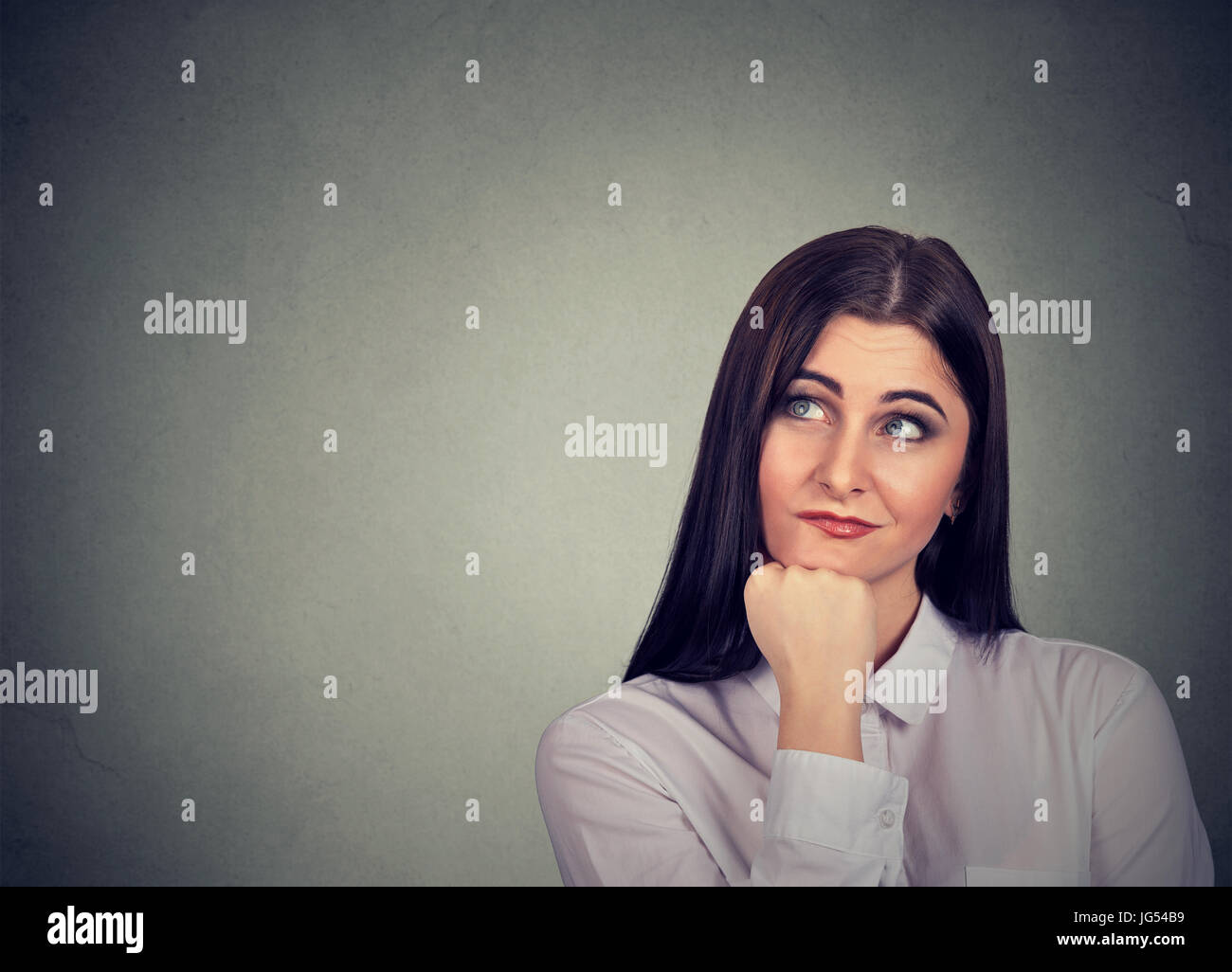 Portrait of a thoughtful woman Stock Photo - Alamy