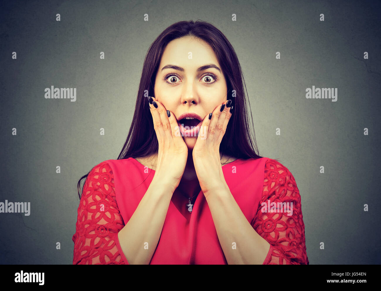 Portrait of a shocked woman Stock Photo - Alamy