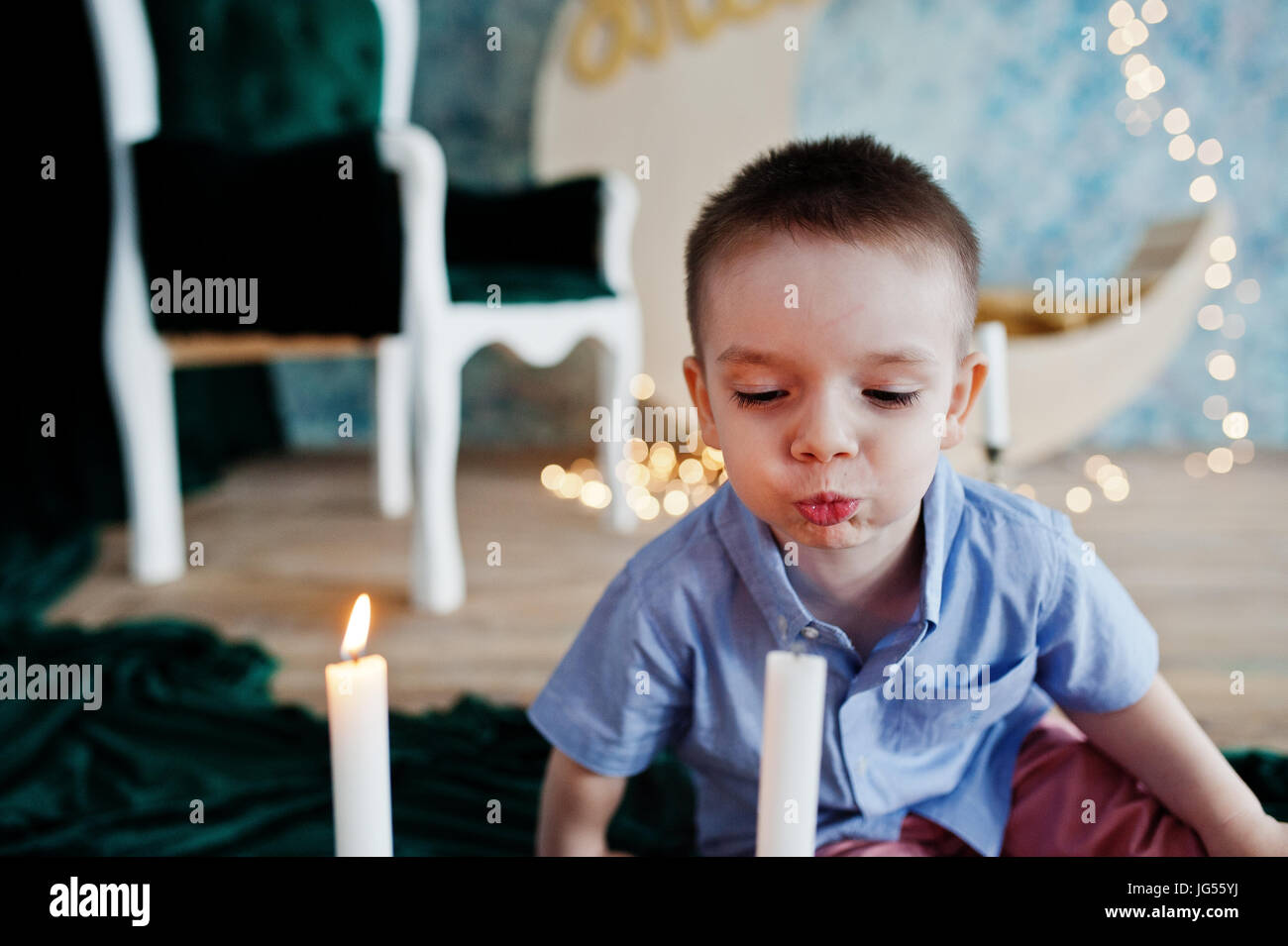 Portrait of an adorable little boy in official clothing posing with ...