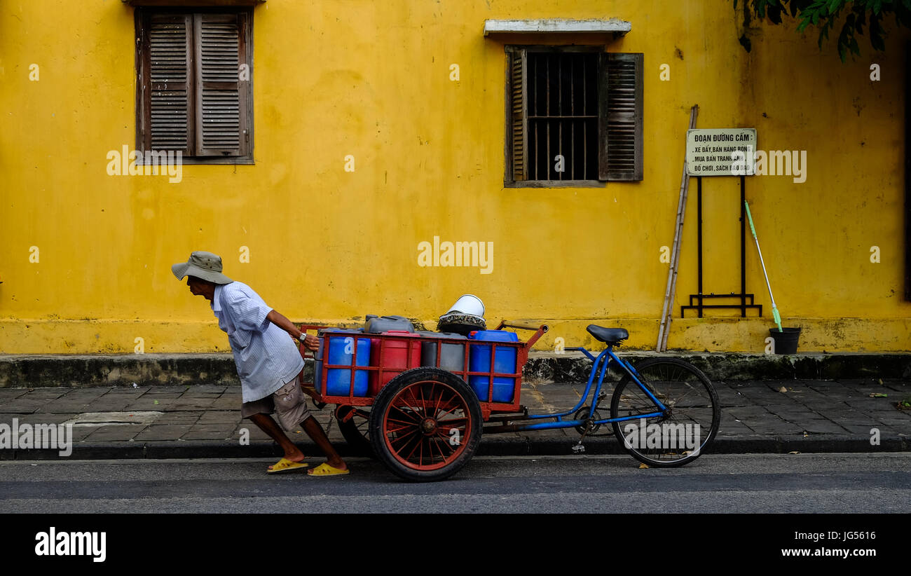 Street man pulls cart hi-res stock photography and images - Alamy