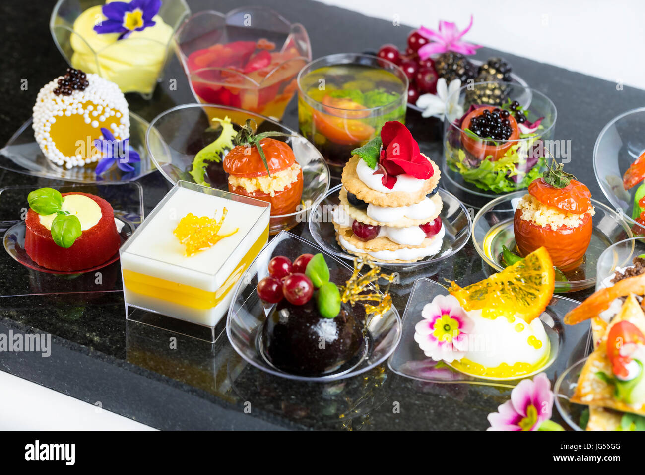 Canape desserts and snack in plastic cups Stock Photo - Alamy