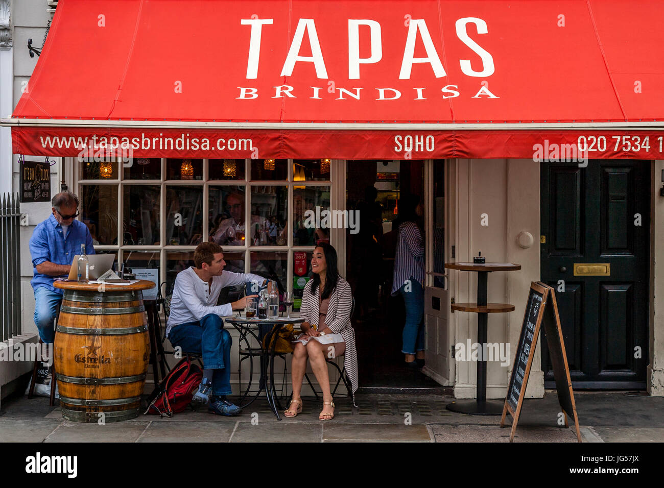 People Sitting Outside The Soho Tapas Brindisa Restaurant, Broadwick Street, Soho, London, UK ...