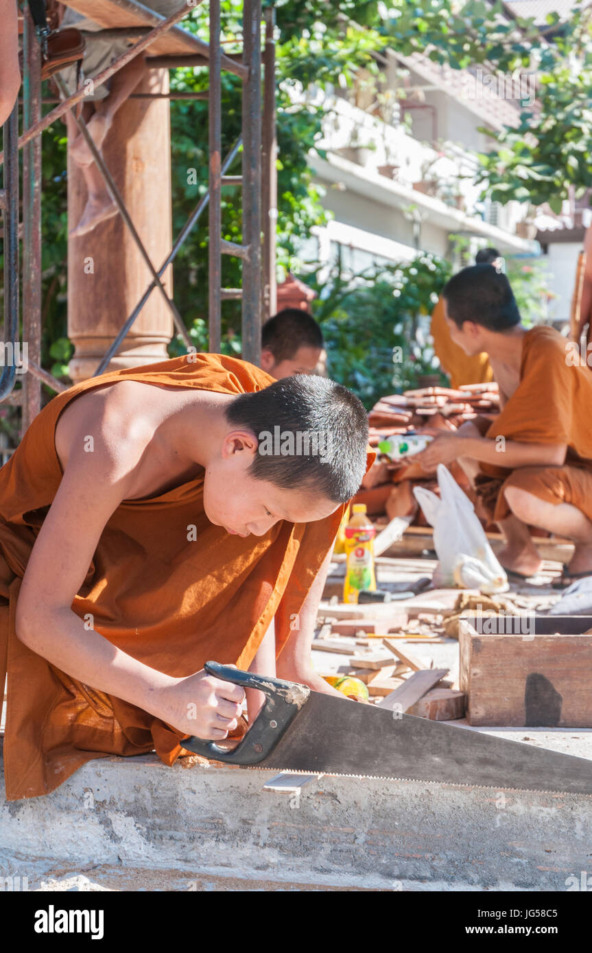 Monks at work -Thailand Stock Photo - Alamy