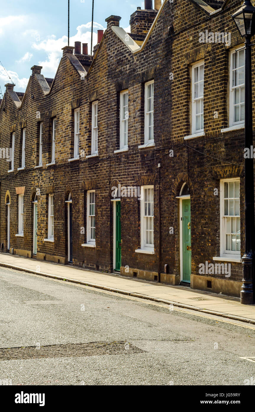 Typical English architecture, residential buildings in a row along the ...